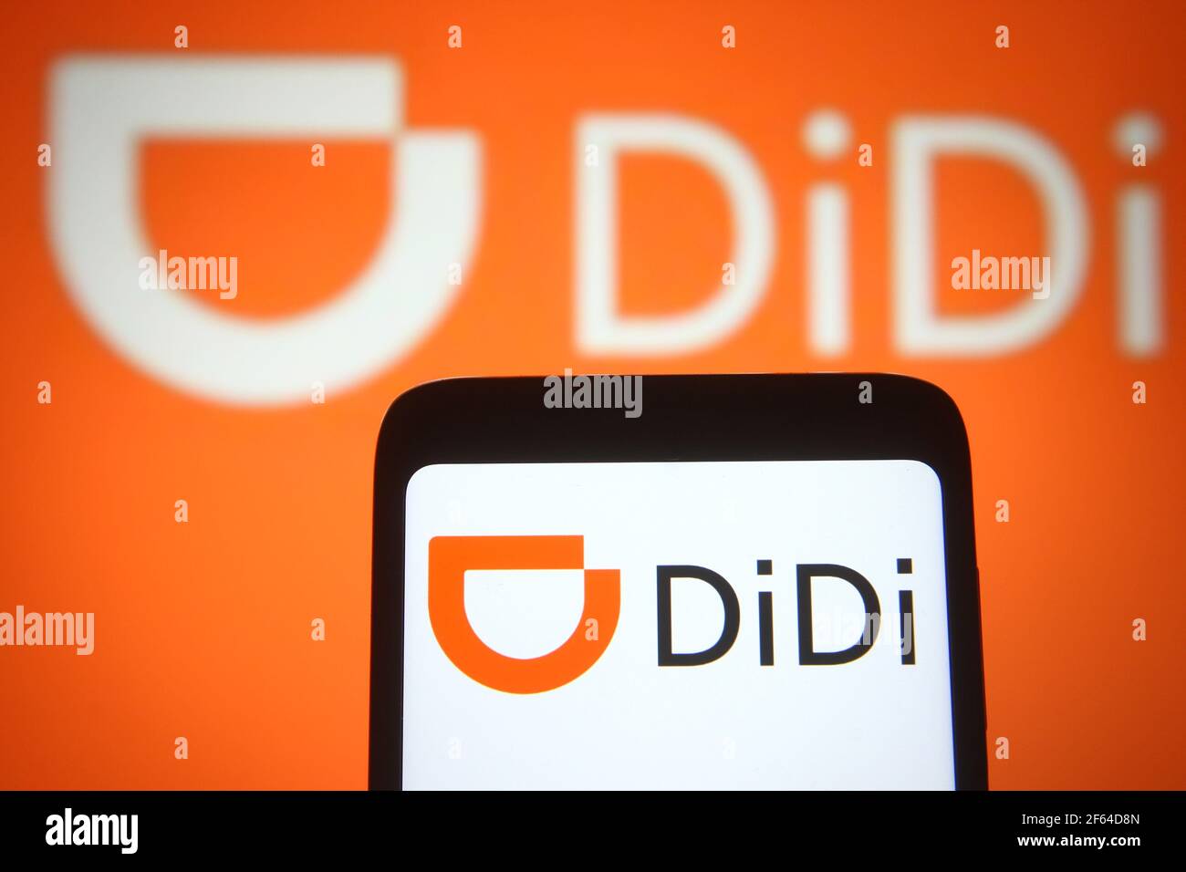 In this photo illustration the DiDi (Didi Chuxing Technology Co.) logo ...