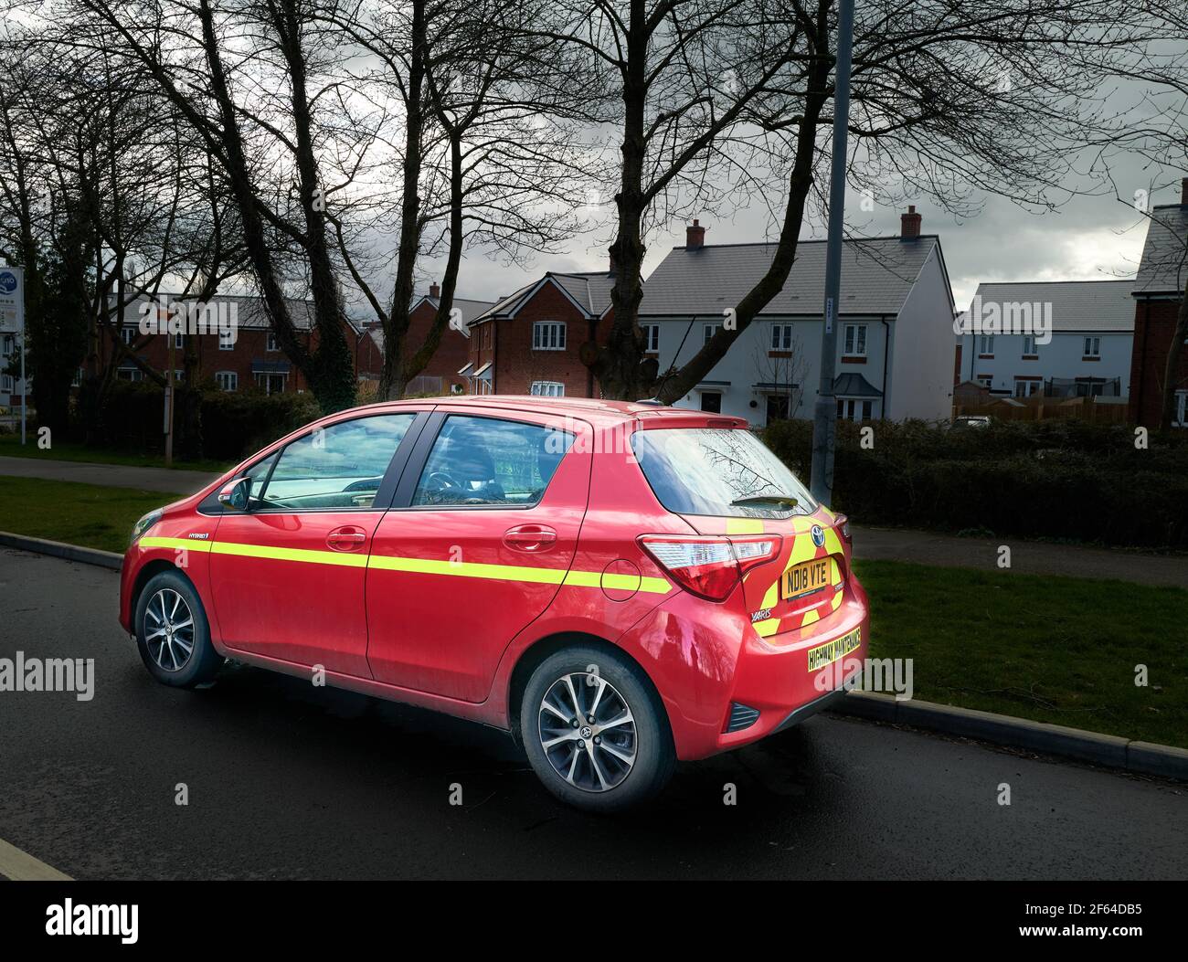 Small red highway maintenance car parked on a road Stock Photo - Alamy