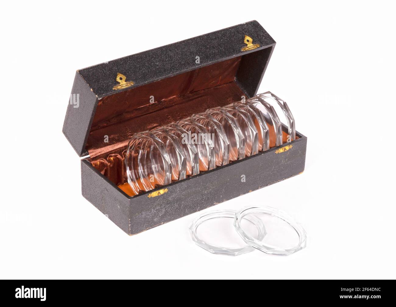 Set of very old glass coasters, isolated Stock Photo - Alamy