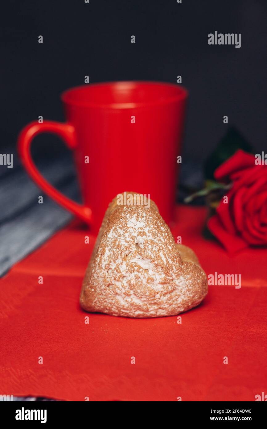 sweet biscuits on a red napkin rose flower snack Stock Photo - Alamy