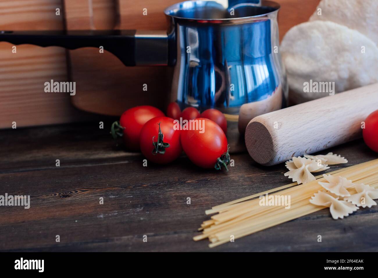 Italian pasta kitchen cooking wood table ingredients Stock Photo - Alamy