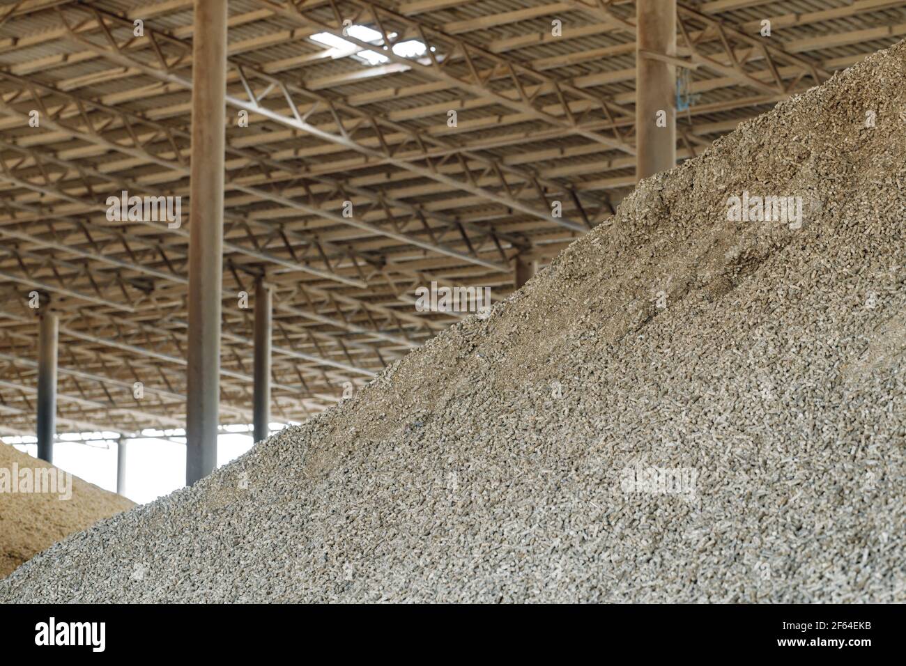 Big pile of pressed wooden pellets in a farm Stock Photo - Alamy