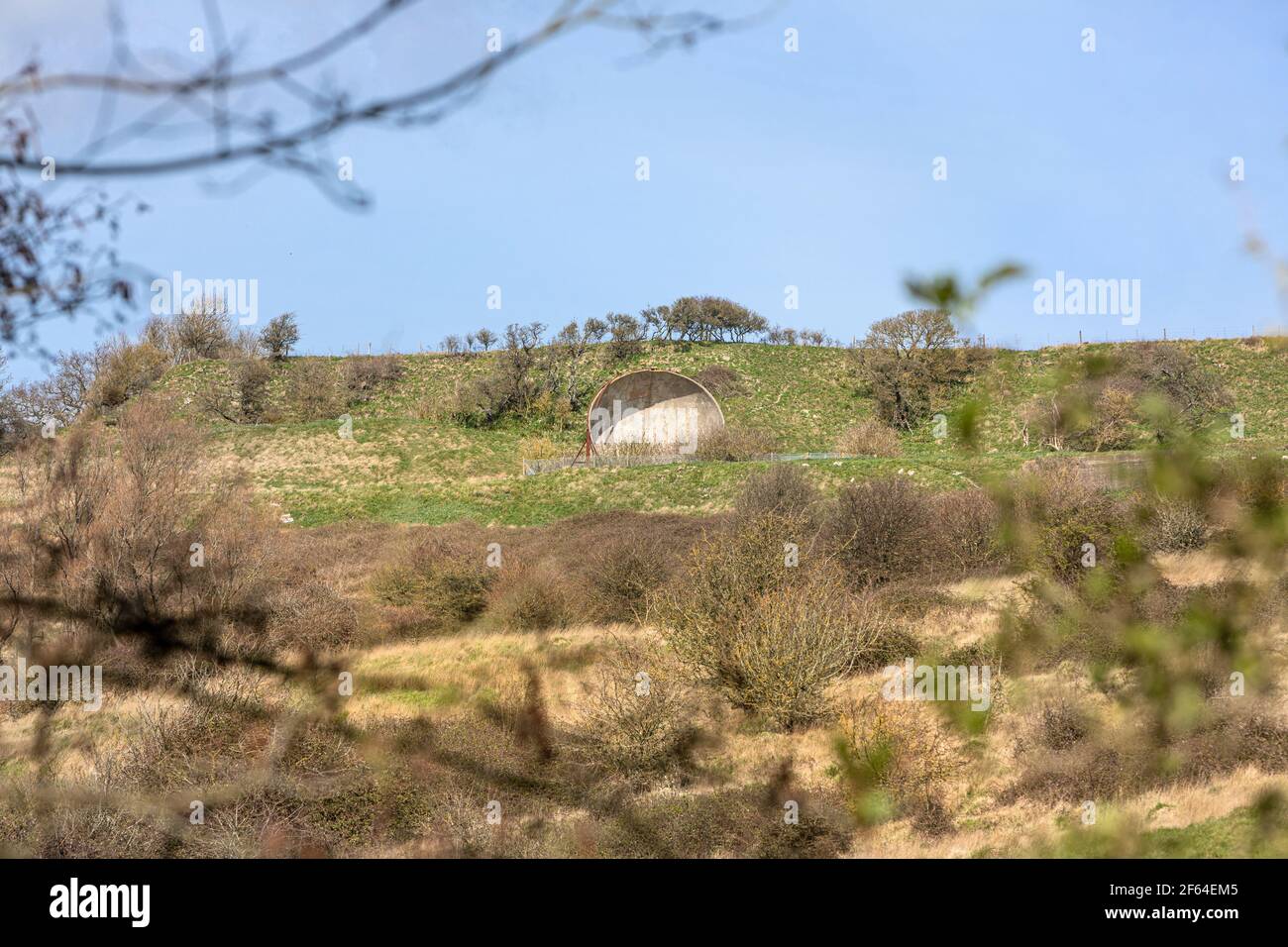 A World War Two sound mirror on Hythe Roughs, Kent, South east England ...