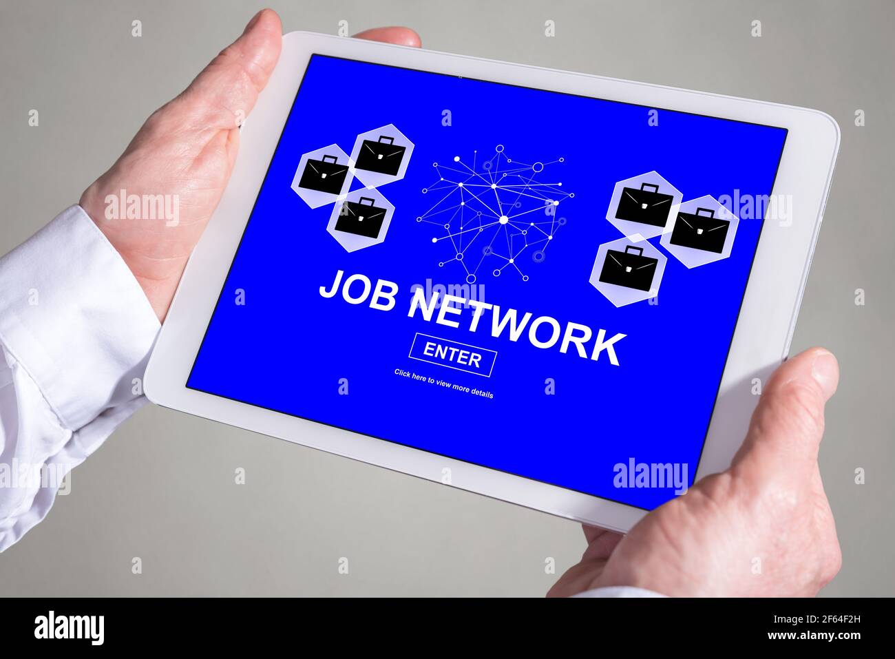 Tablet screen displaying a job network concept Stock Photo - Alamy
