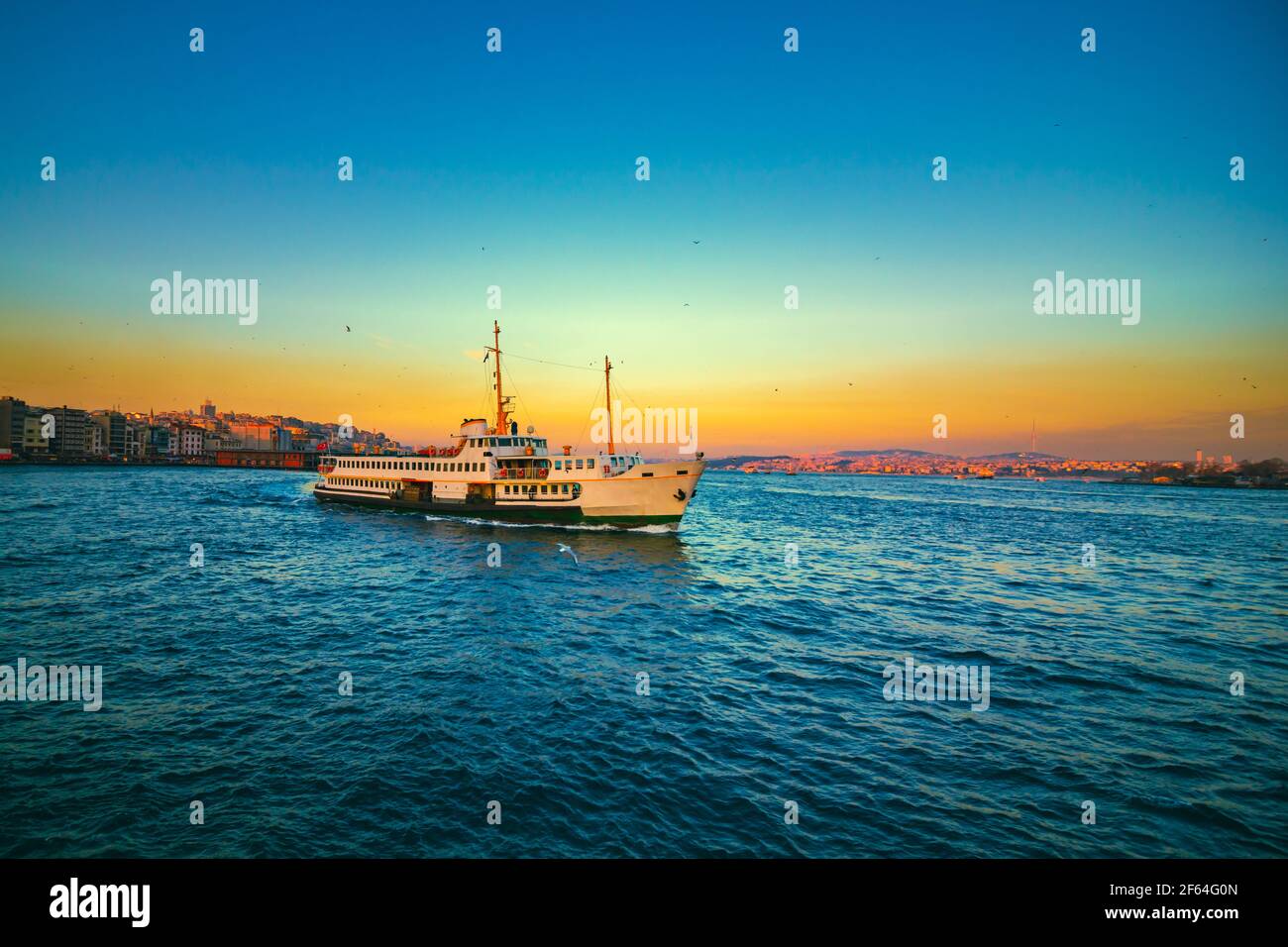 Ferry and Cityscape of Istanbul at sunset. Istanbul background photo ...