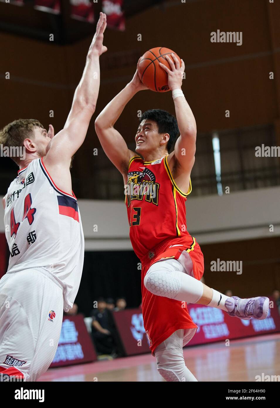 Zhuji, China's Zhejiang Province. 30th Mar, 2021. Jiang Yuxing (R) of ...