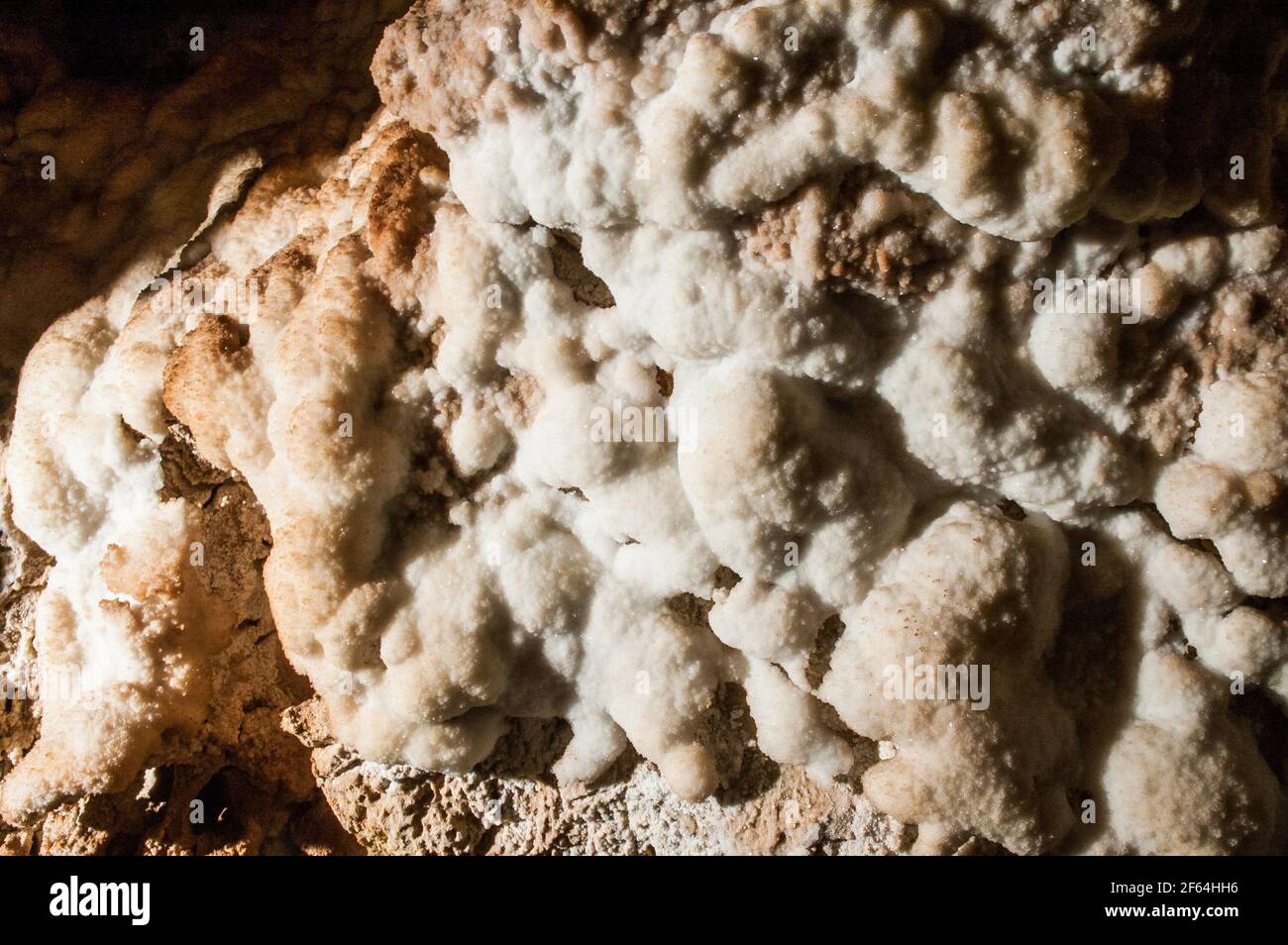 Gypsum and calcium carbonite crystal minerals in a cave Stock Photo - Alamy
