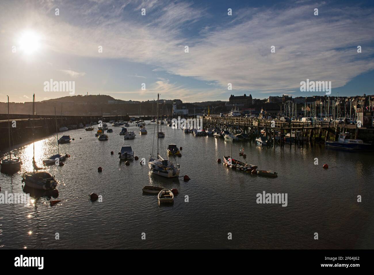 Landscape panorama view of coastal seaside town harbor front with ...