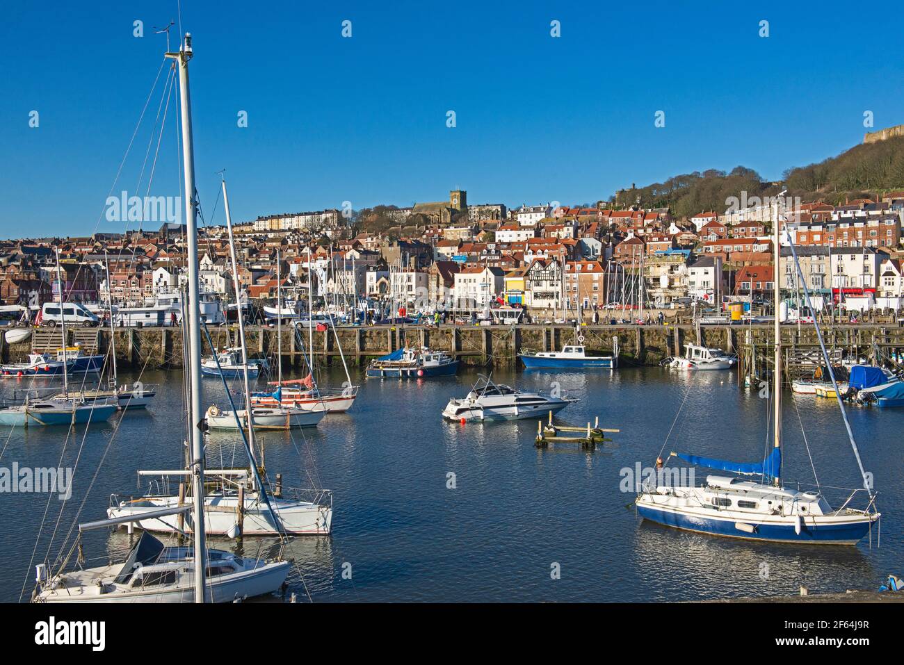 Landscape panorama view of coastal seaside town harbor front with ...