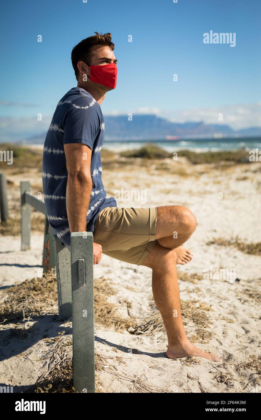 People on beach face mask face masks hi-res stock photography and ...
