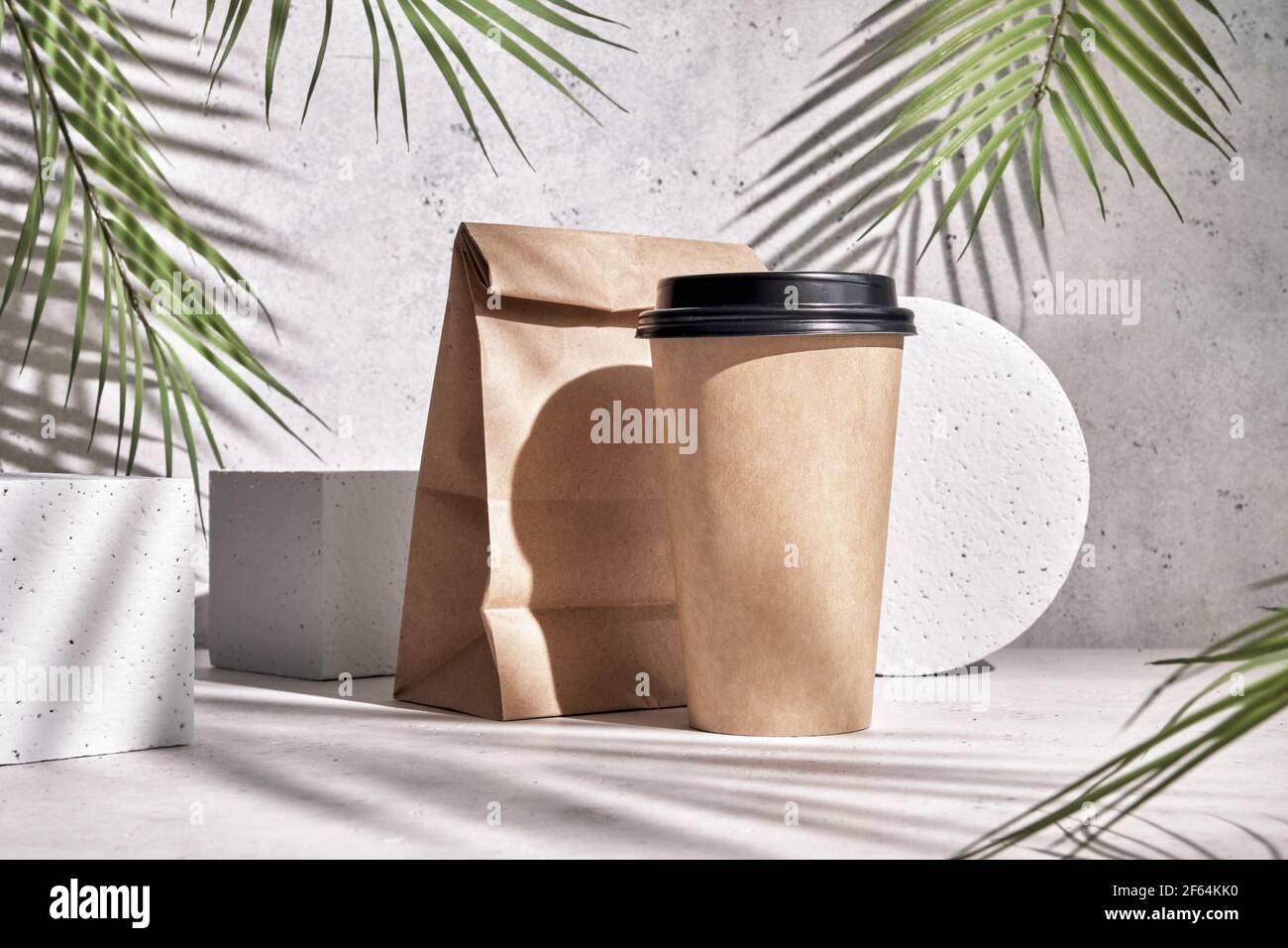 Take out coffee. Paper cup of coffee on grey background Stock Photo - Alamy