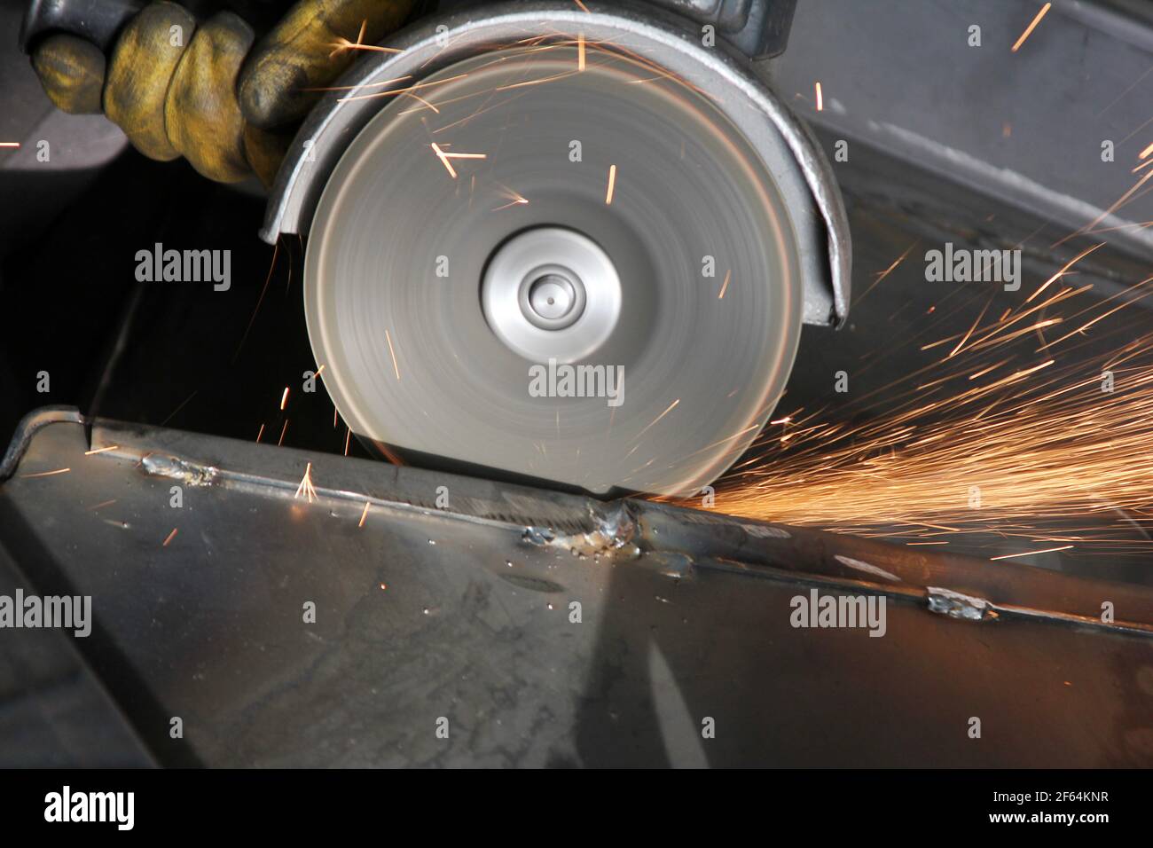Steel cutter grinder and sparks in workshop Stock Photo - Alamy