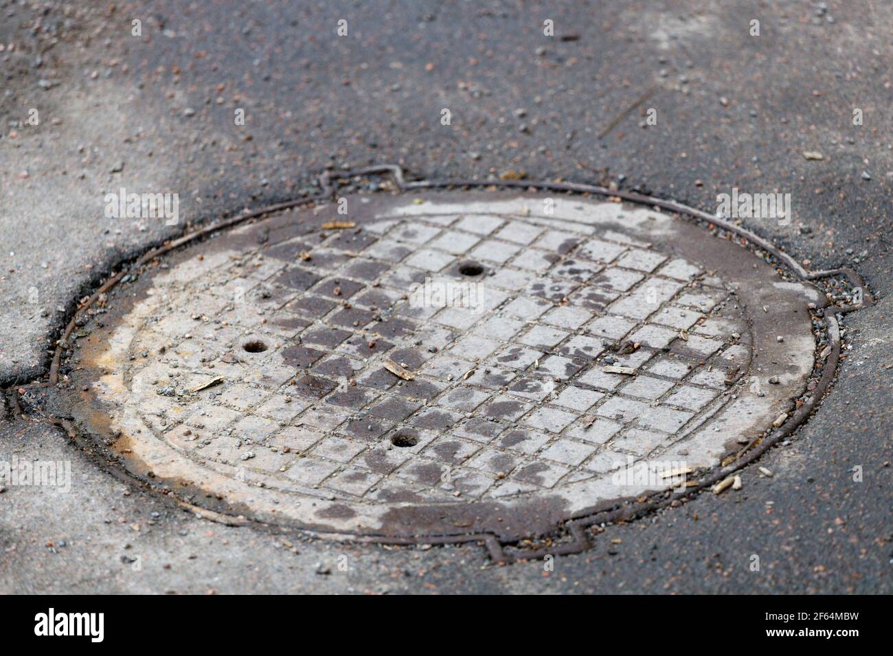 sewer hatch on the street of the city. High quality photo Stock Photo ...