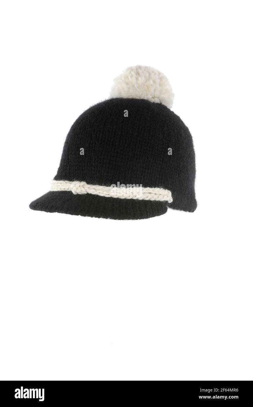 Knitted winter cap on white background. Studio shoot Stock Photo - Alamy
