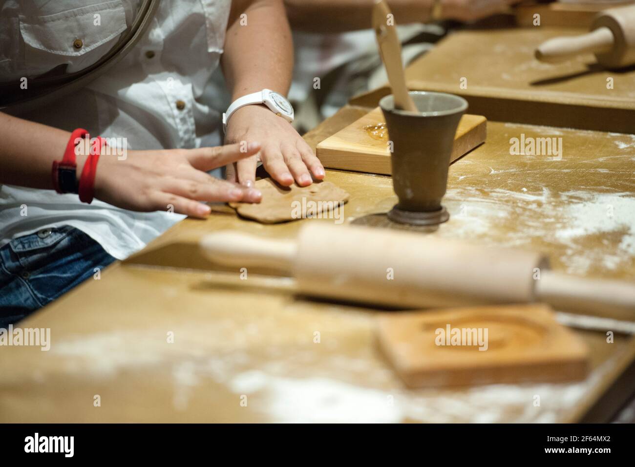 Chef woman hands making pasta. Cooking process. Raw food photography ...