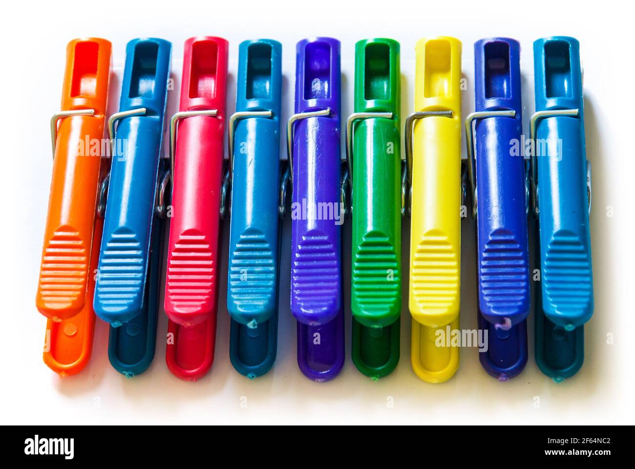 Color clothes-peg isolated on white background Stock Photo - Alamy