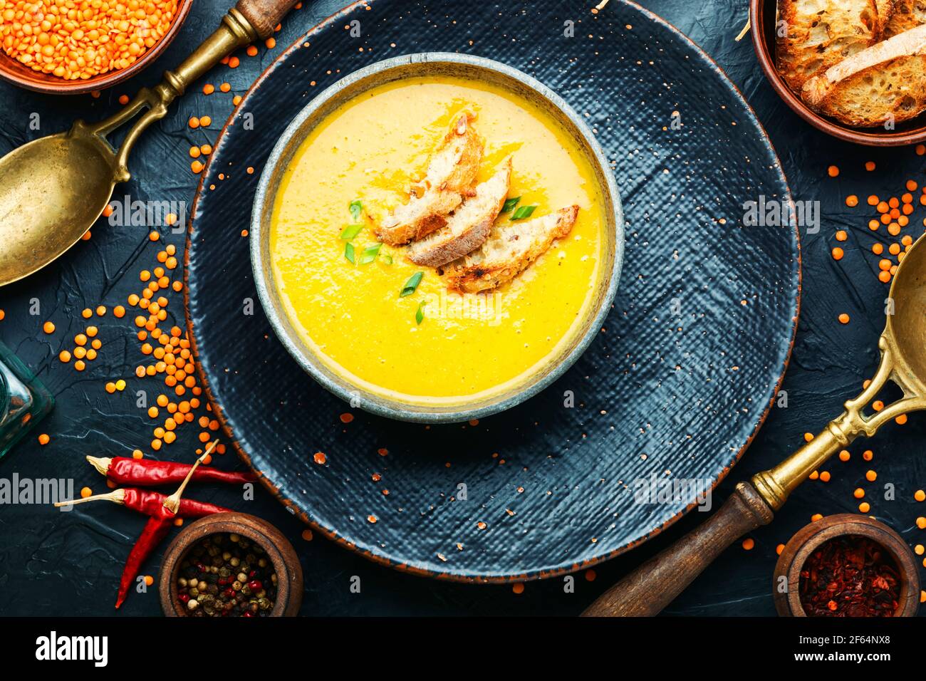 Plate of aromatic red lentil soup.Lentil soup with ingredients Stock ...