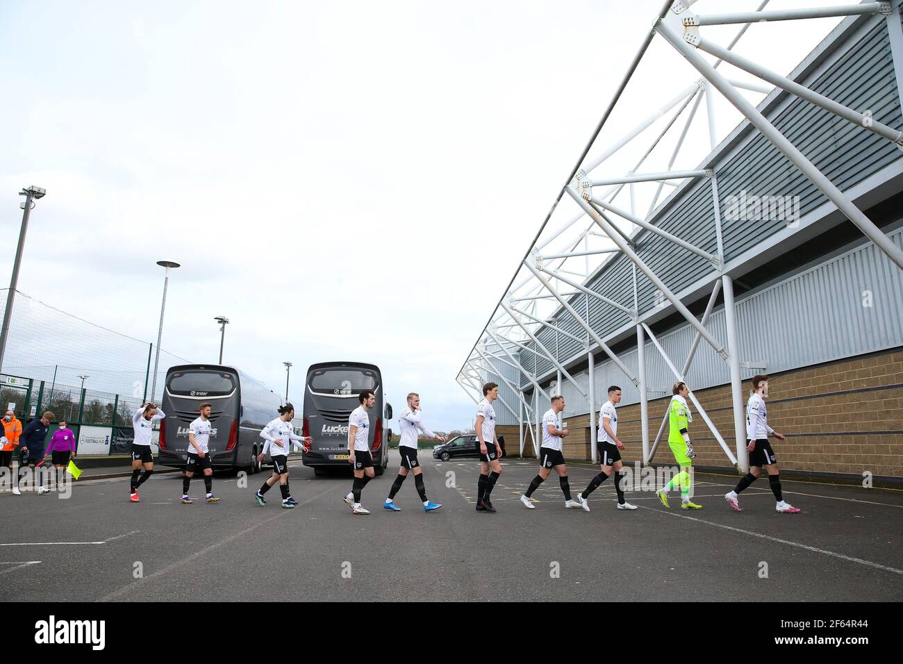Portsmouth players exit the temporary away dressing room outside the ...