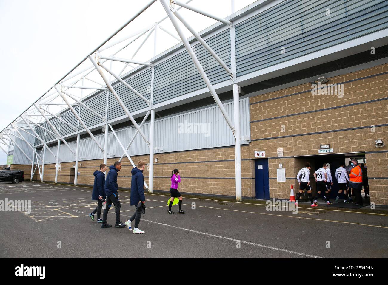 Portsmouth players exit the temporary away dressing room outside the ...