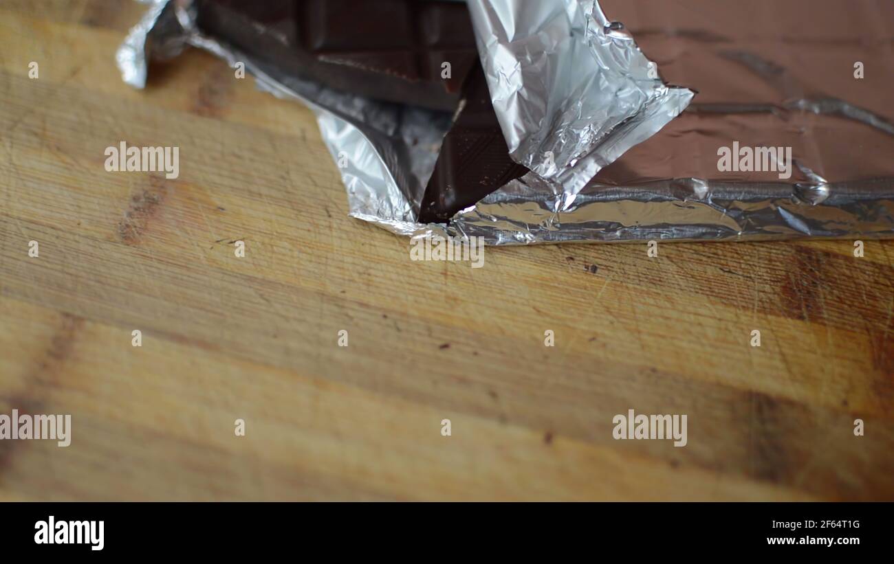 silver paper wrapped chocolate bars Stock Photo - Alamy