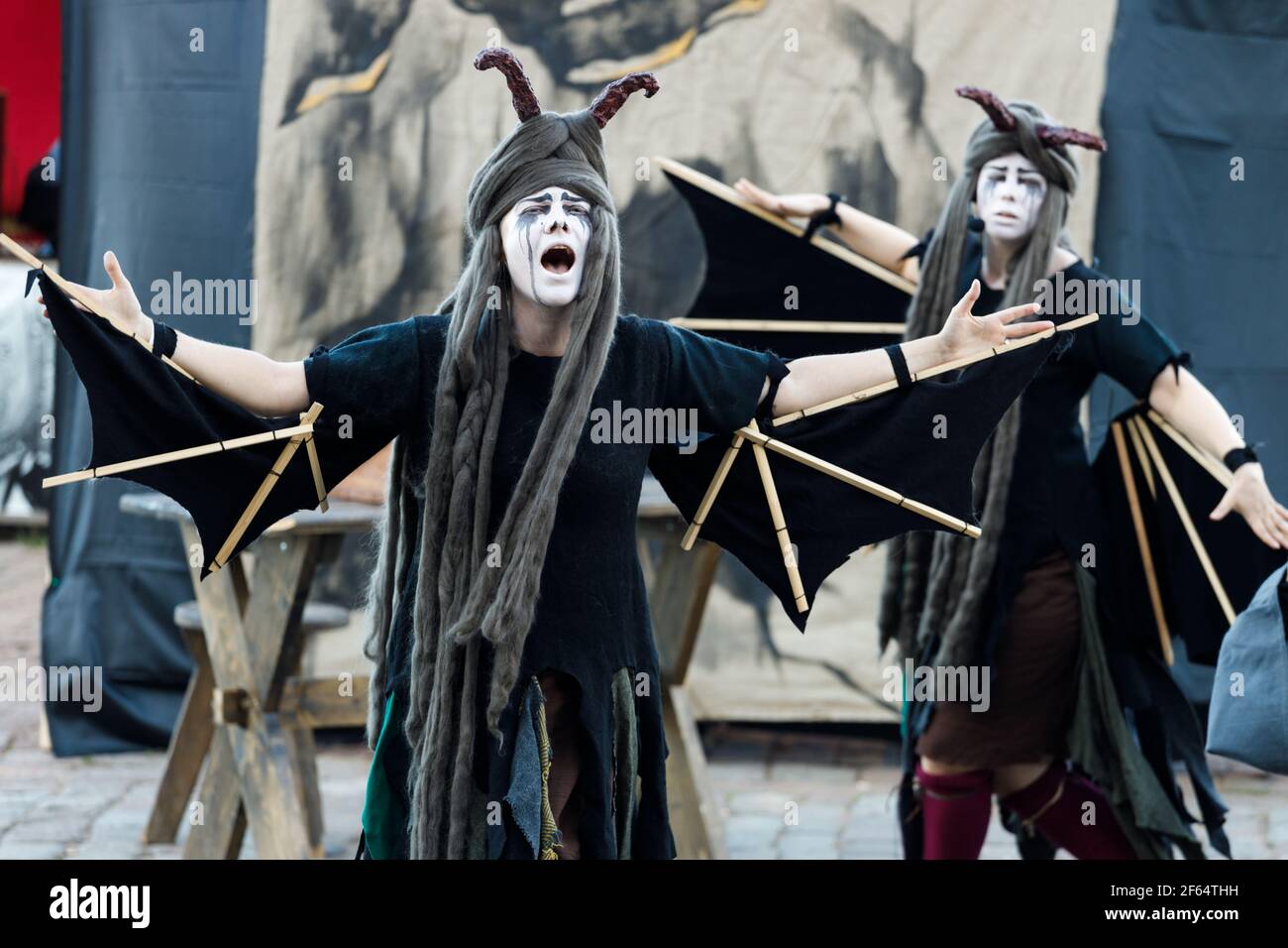 Russia. Vyborg 08.08.2020 Actors in gargoyle costumes on the street of ...