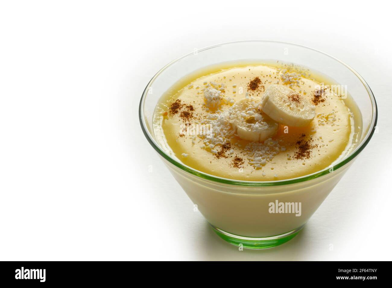 Milk and banana pudding. With coconut and cinnamon Stock Photo - Alamy