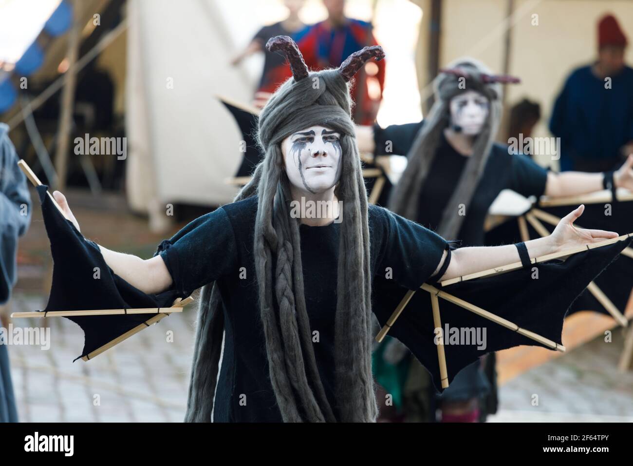 Russia. Vyborg 08.08.2020 Actors in gargoyle costumes on the street of ...