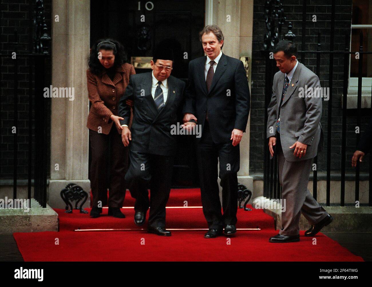 Indonesian President Wahid January 2000 is helped from no 10 by his ...