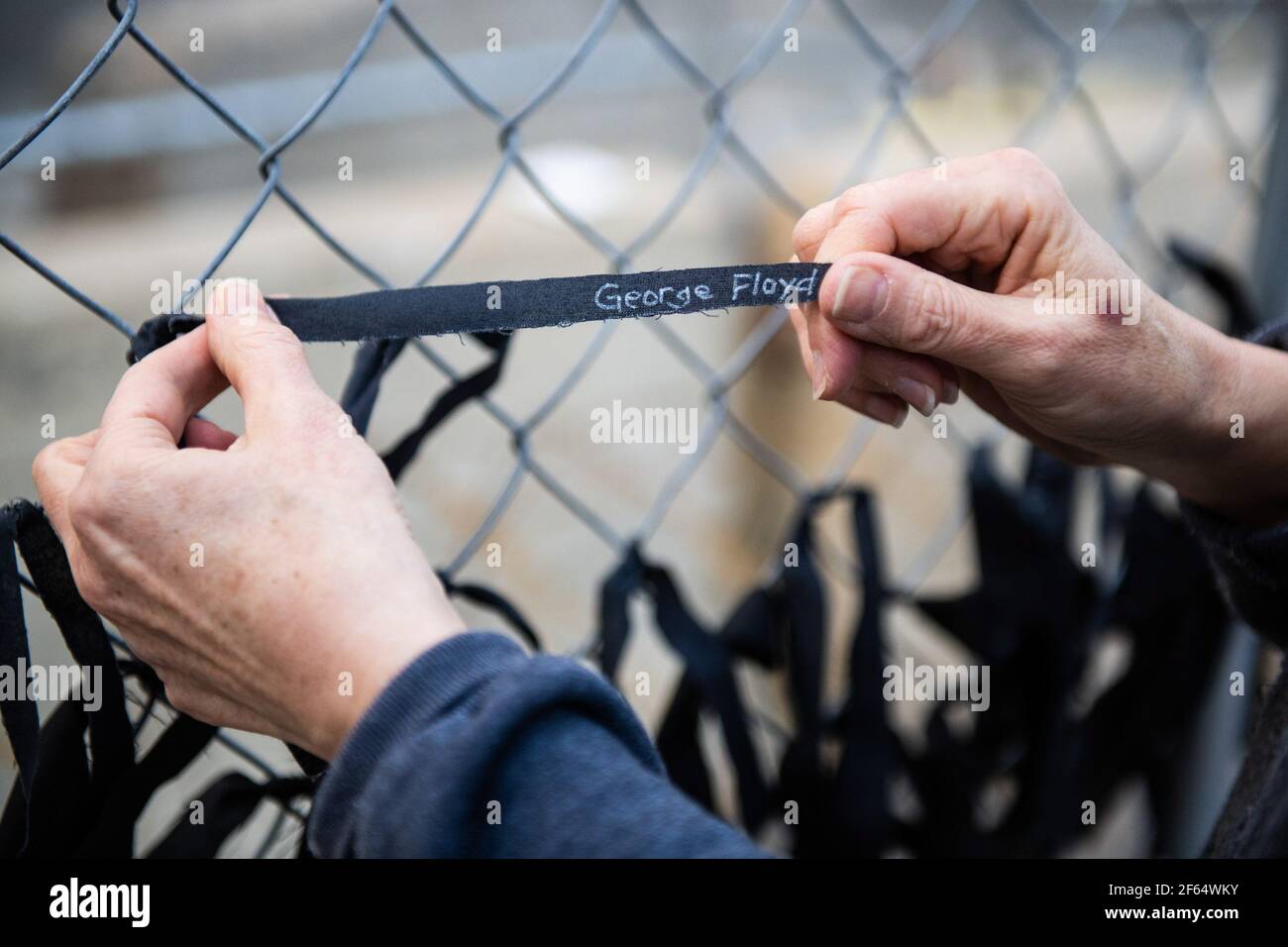 Minneapolis, United States. 29th Mar, 2021. Protestors place pieces of ...