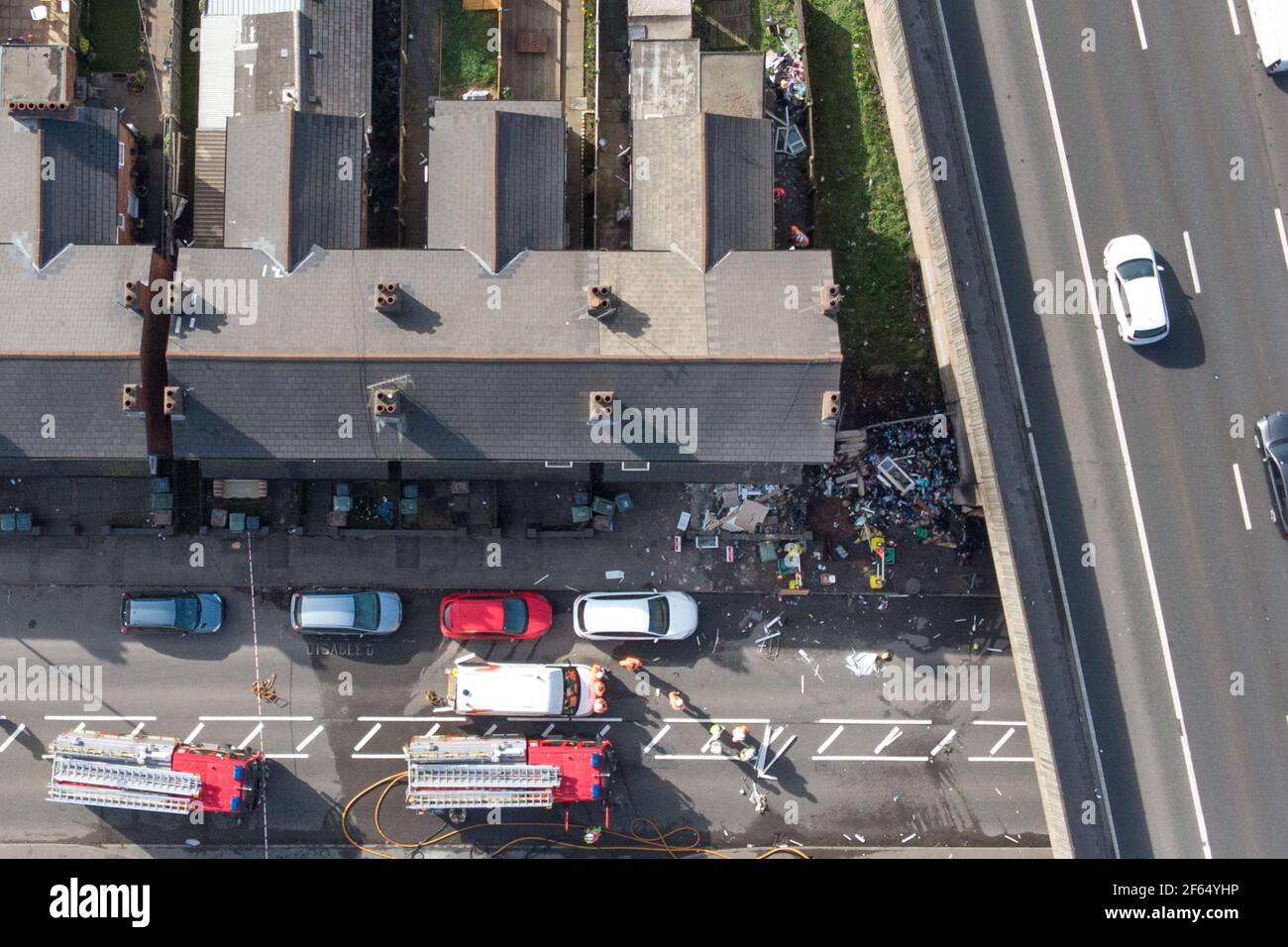 Walsall, West Midlands, UK. 30th Mar, 2021. A house has been severely ...