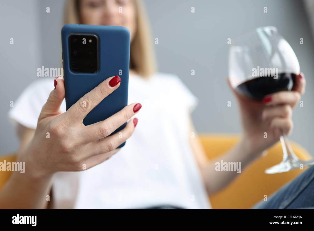 Woman holds smartphone arm hi-res stock photography and images - Alamy