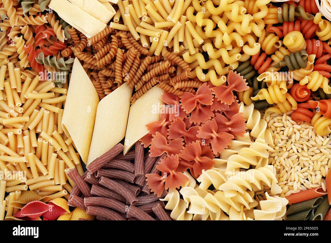 Selection of dried Italian pasta types with tricolour & whole wheat ...