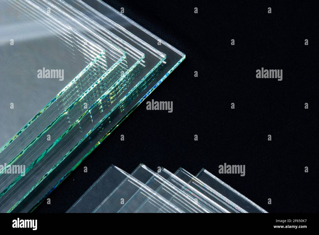 Sheets of Factory manufacturing tempered clear float glass panels cut ...