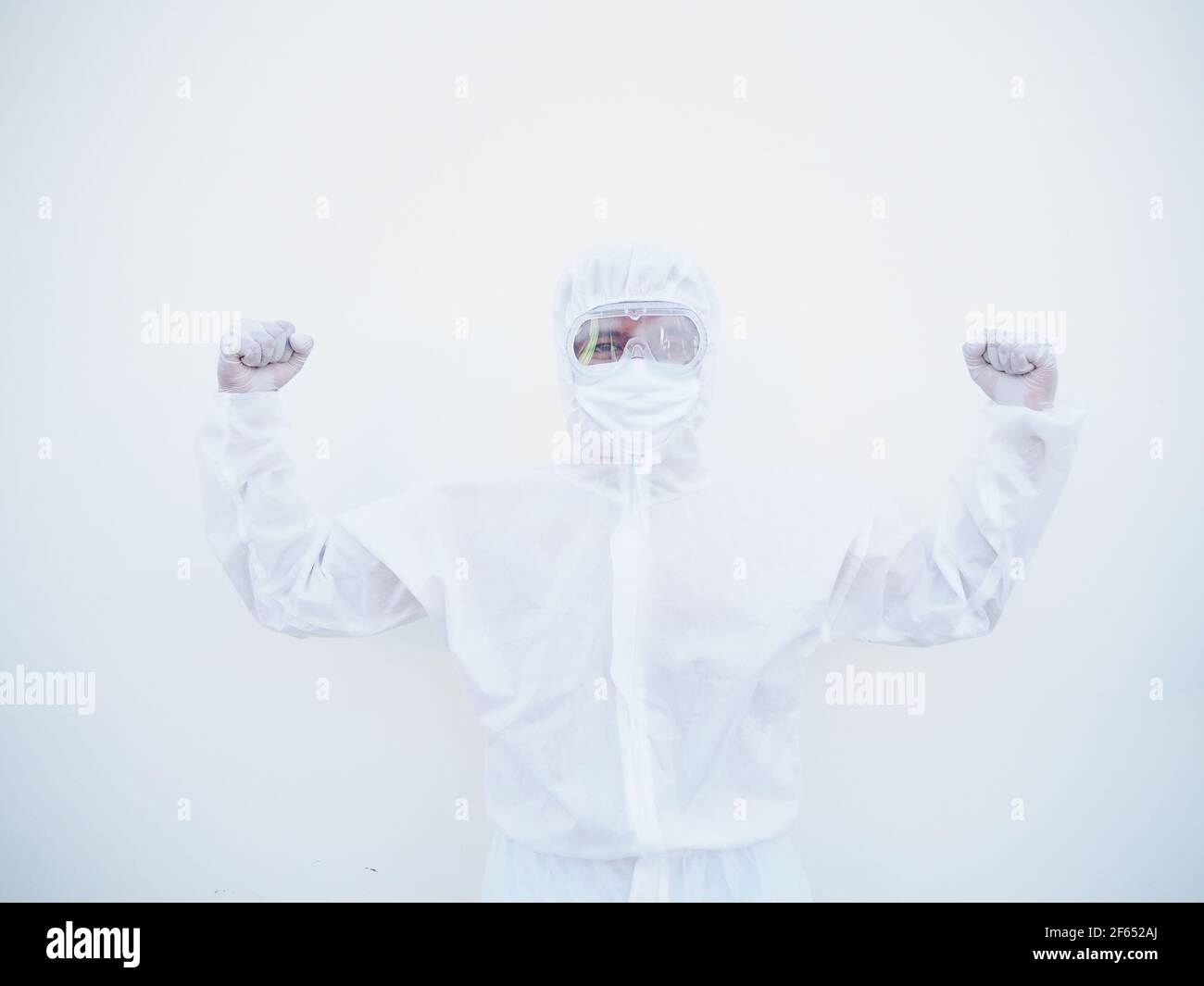 Successful emotional asian doctor or scientist in PPE suite uniform ...