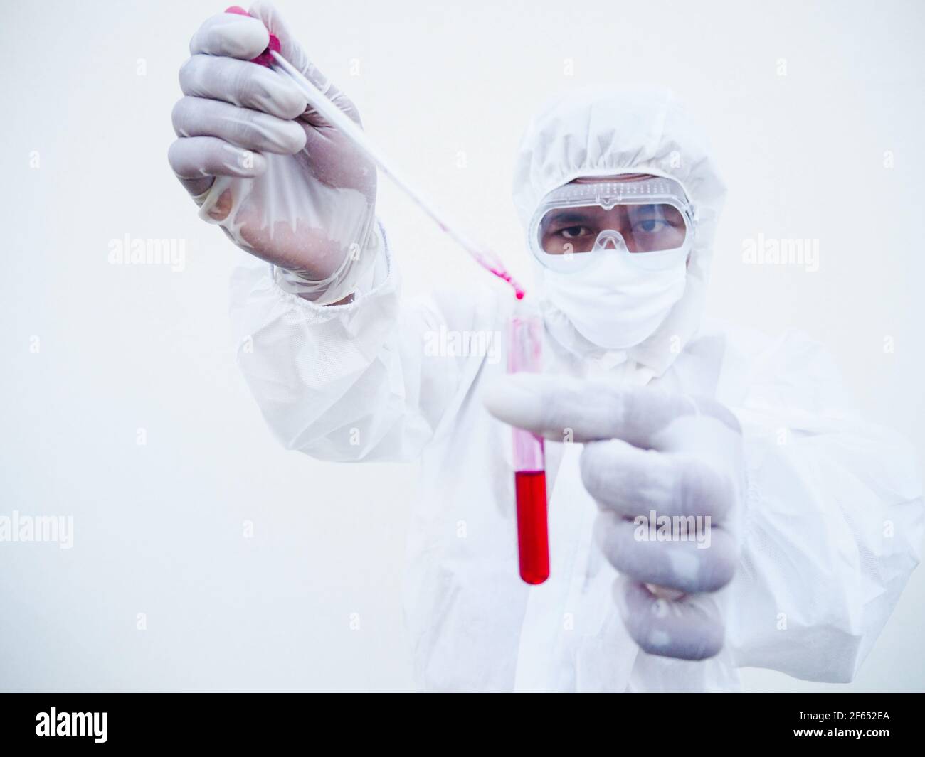 Asian doctor or scientist in PPE suite uniform. Personal protective ...
