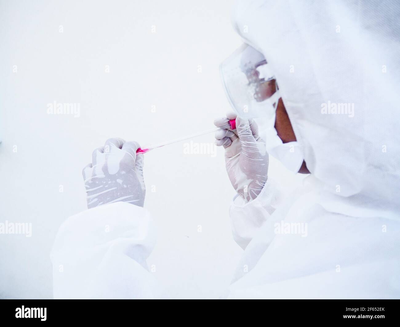 Asian doctor or scientist in PPE suite uniform. Personal protective ...