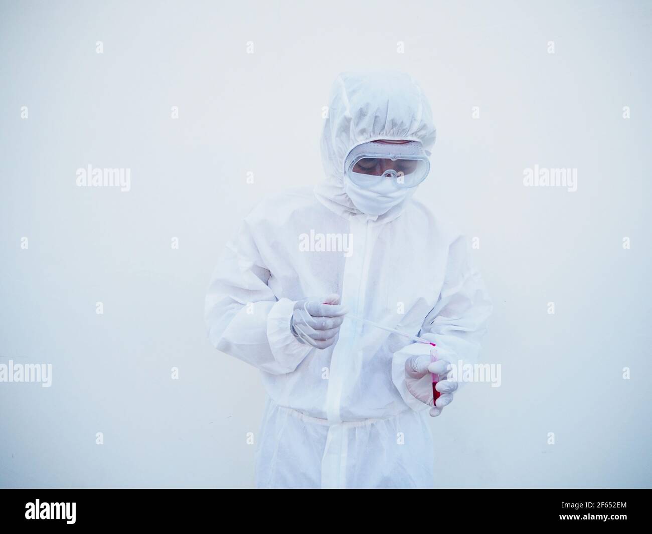 Asian doctor or scientist in PPE suite uniform. Personal protective ...