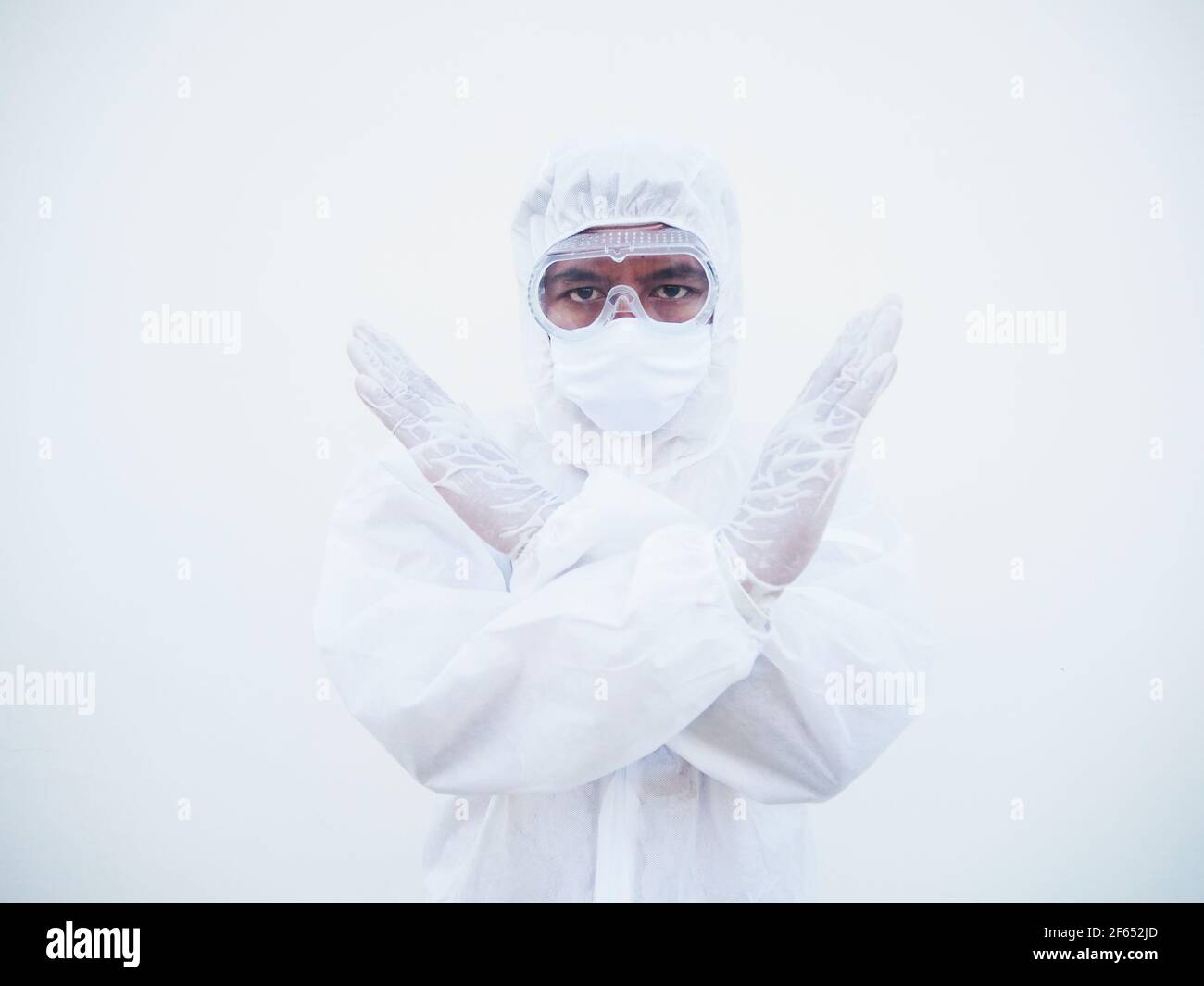 Asian doctor or scientist in PPE suite uniform showing x sign with his ...
