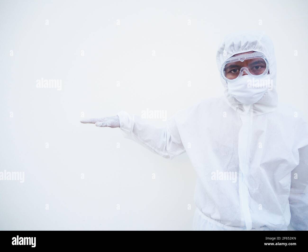 Doctor or scientist in PPE suite uniform showing hands down with copy ...