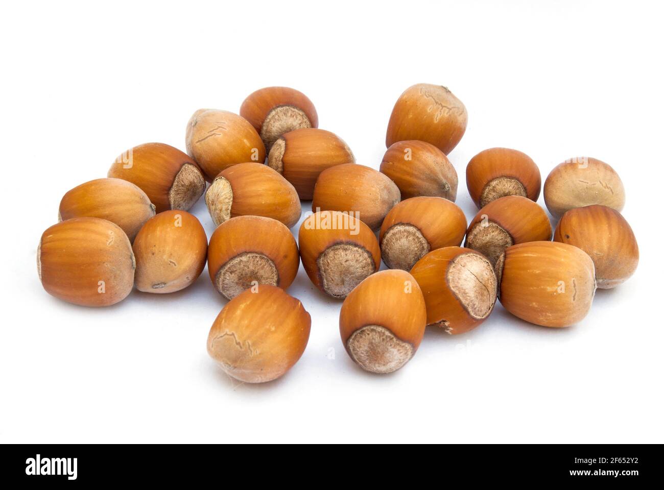 hazelnut heap isolated on white background. Top view Stock Photo - Alamy