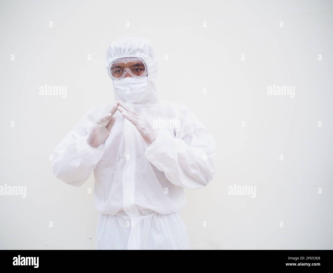 Asian male doctor or scientist in PPE suite uniform In a manner that ...
