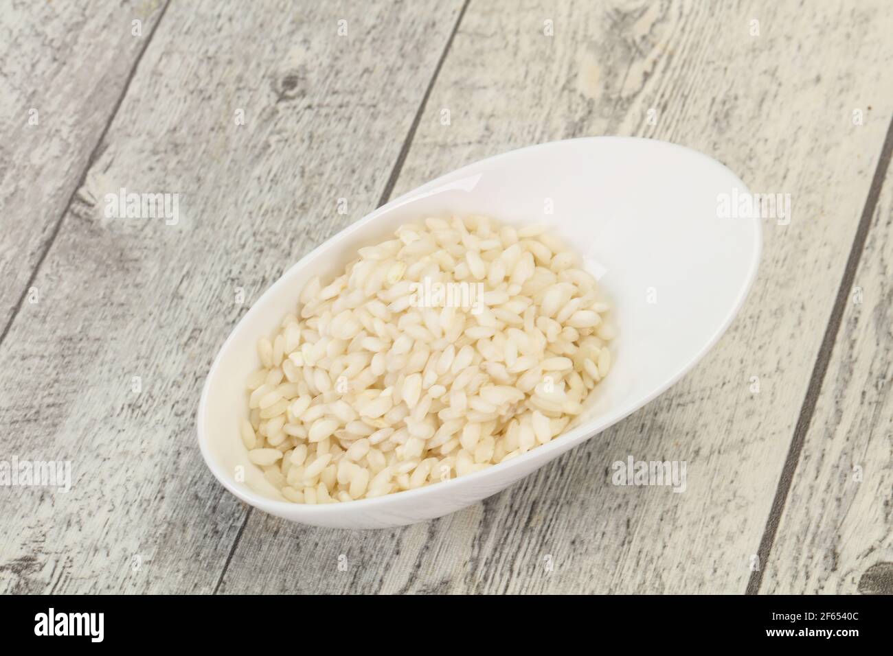 Raw Arborio rice for Italian risotto Stock Photo - Alamy