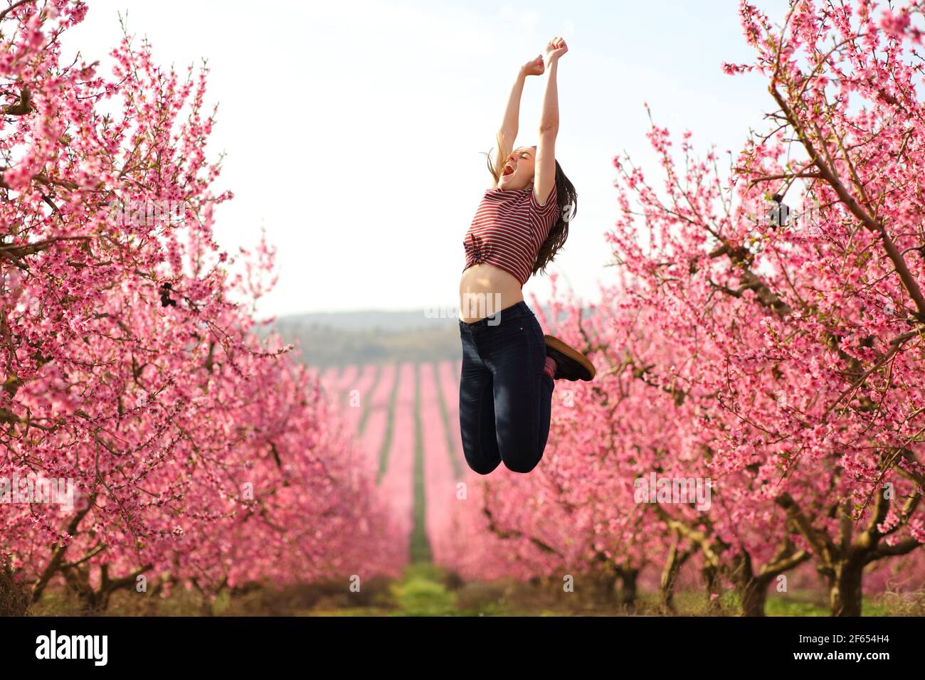 Happy jumping nature hi-res stock photography and images - Alamy