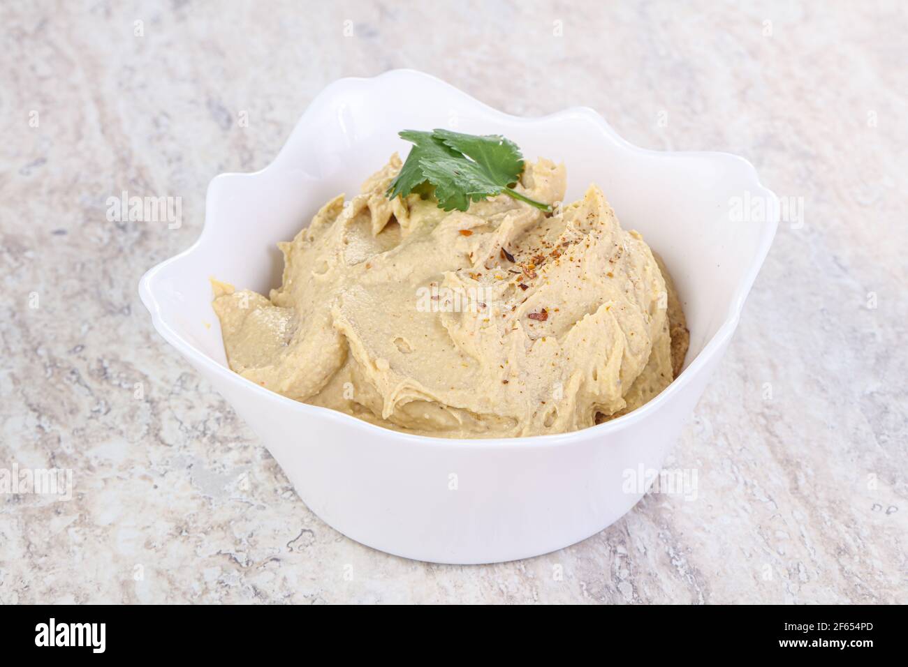 Vegan cuisine – Traditional Jewish Hummus with olive oil Stock Photo ...