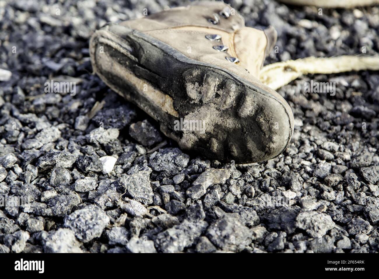 Trekking boot broken with mud, extreme sport, special footwear Stock ...