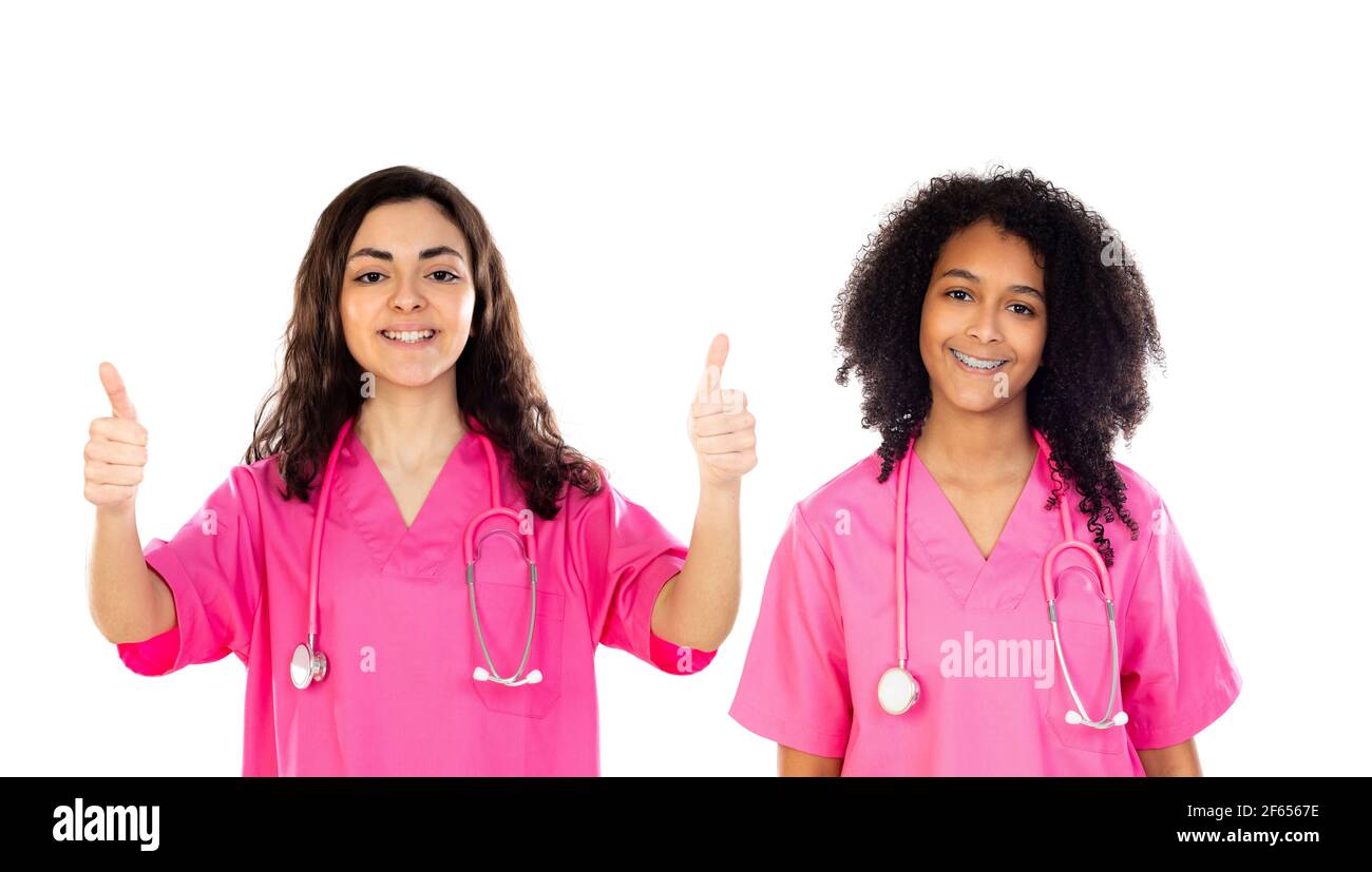 Two young student doctors isolated on a white background Stock Photo ...