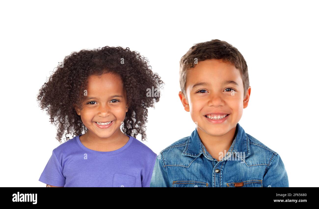 Two beautiful children looking at camera isolated on a white background ...