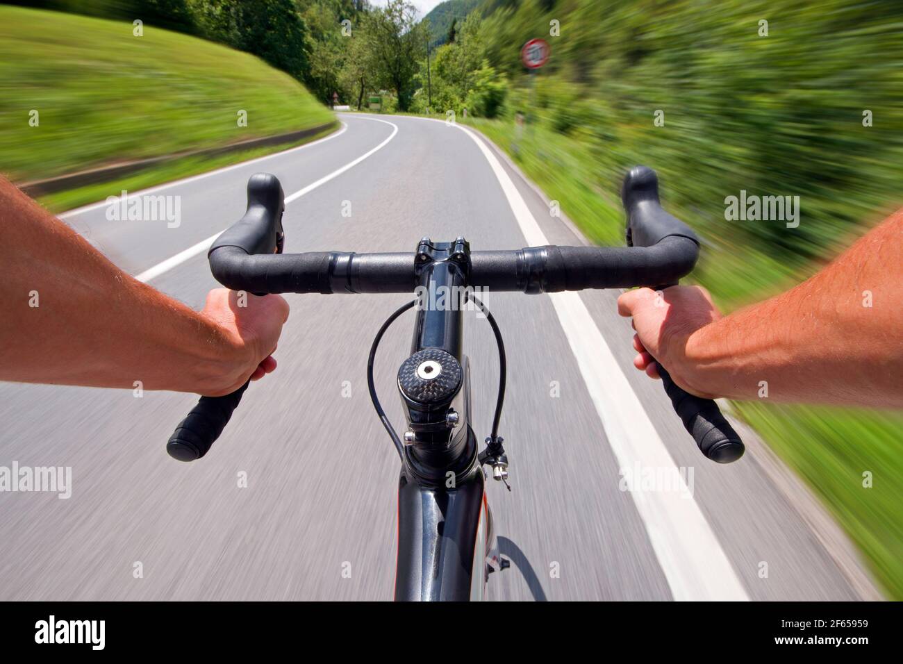 Road cycling wide angle speed shoot in nature. Landscape cycling in ...