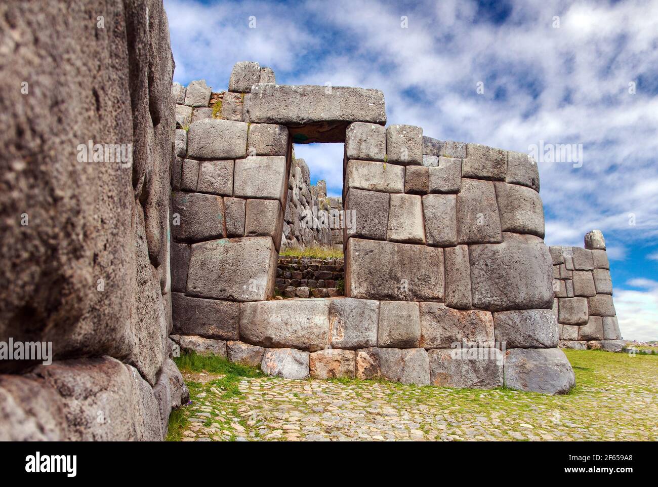 Stone door. View of Sacsayhuaman, Inca ruins in Cusco or Cuzco town ...