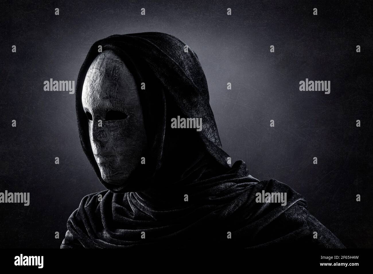 Hooded figure cape hi-res stock photography and images - Alamy